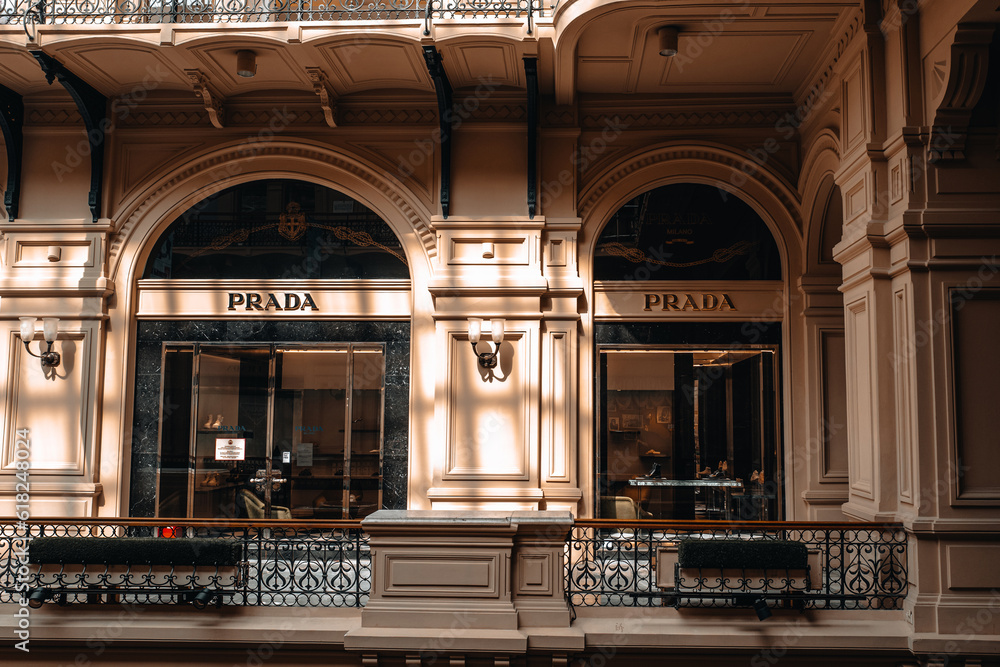 Beige classy facade of Prada boutique inside the famous shopping mall ...