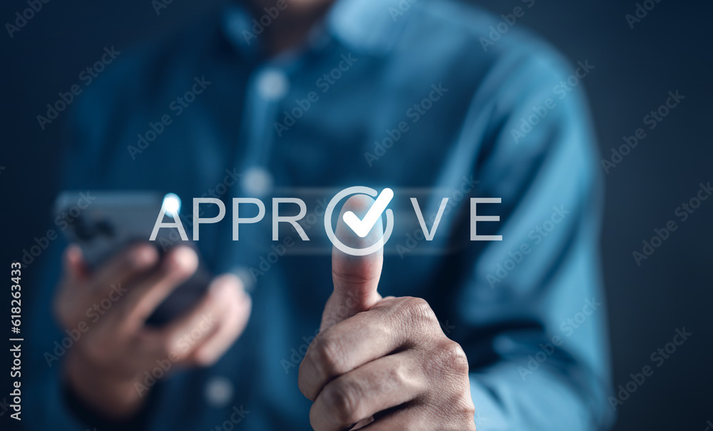 Hand man touching tick or check mark correct sign for quality standards ...