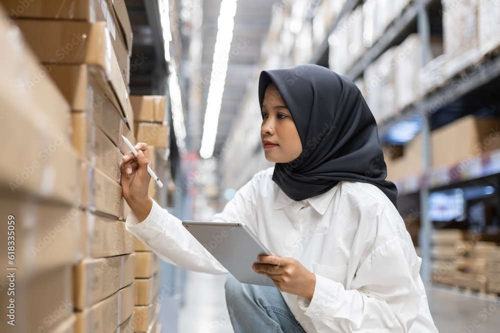 Asian muslim female headscarf hijab using digital tablet checklist ...