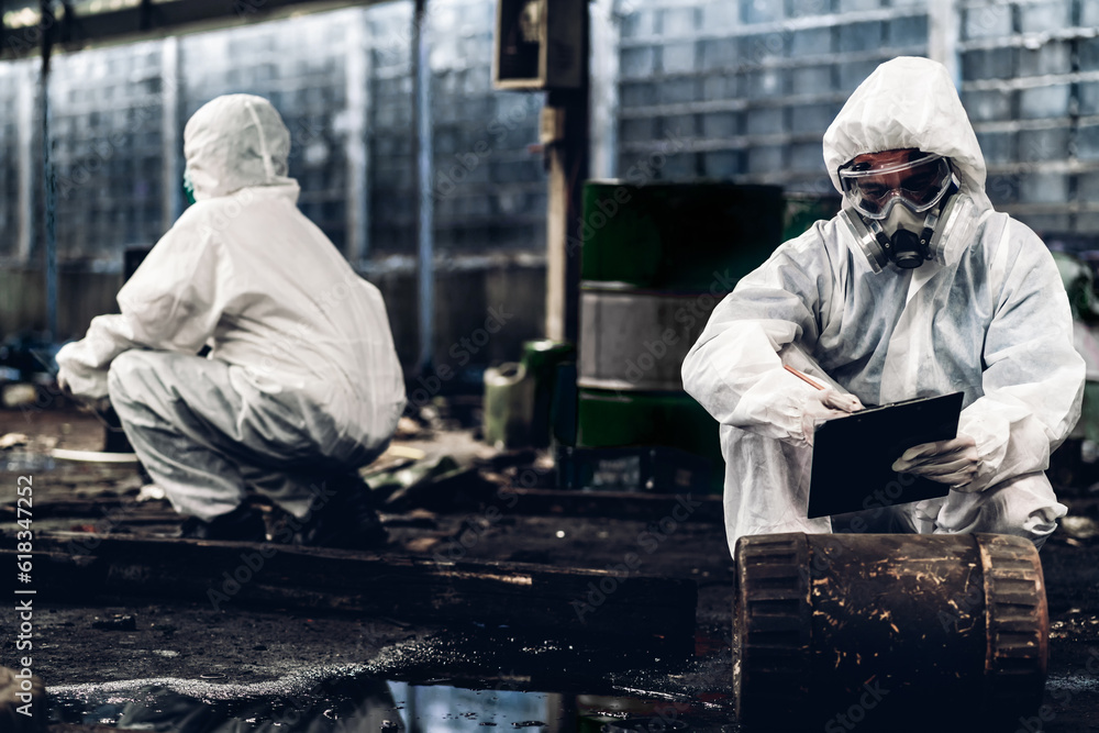 Scientist wear Chemical protection suit check danger chemical, working ...