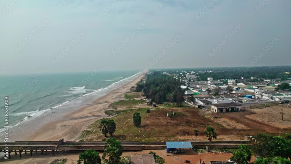 beach and houses side by side areal drone shot addaripeta beach 4k ...