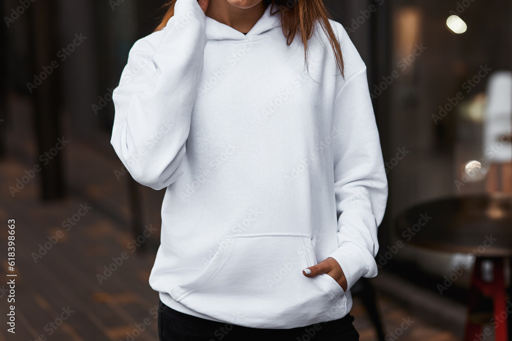 young girl wears white hoodie. white hoodie mock-up | Uwalls.co.uk