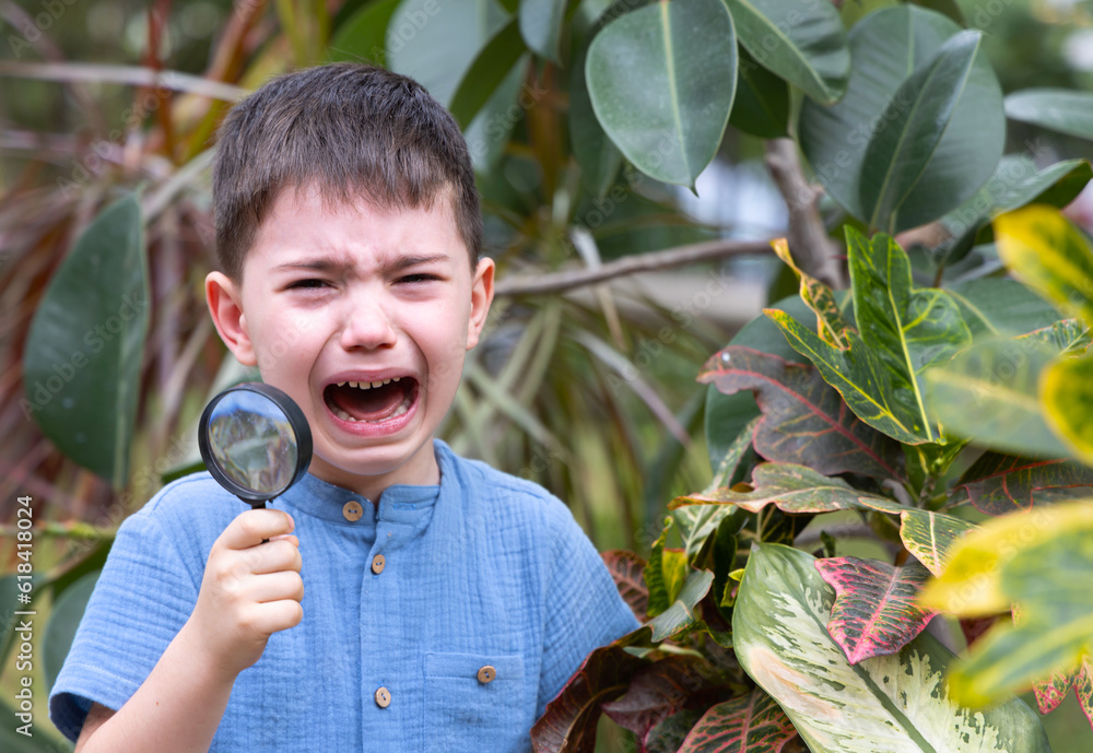 cute preschooler boy crying in classroom or outside with backpack in ...