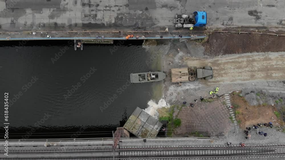 Pontoon bridge of the Ukrainian army. Installation of a temporary ...