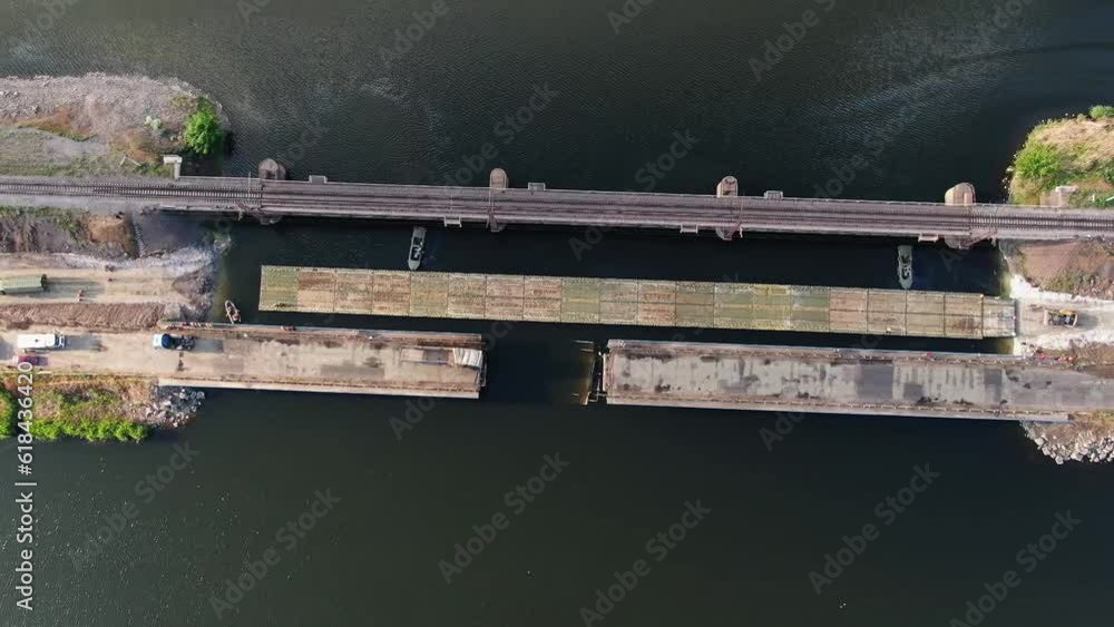 Pontoon bridge of the Ukrainian army. Installation of a temporary ...