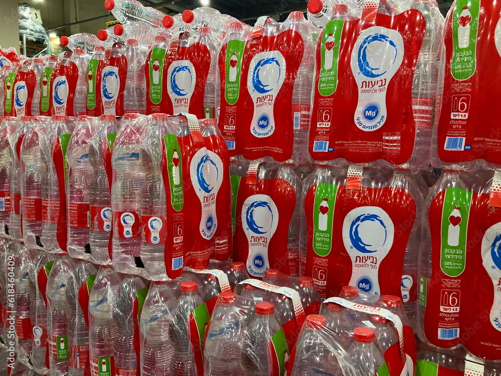Mineral water in the store. Two-liter bottles, packages with drinking ...