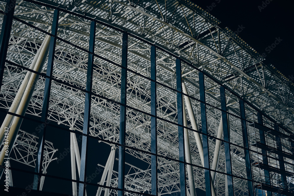 Load-bearing metal structures of industrial building. Facade of railway ...