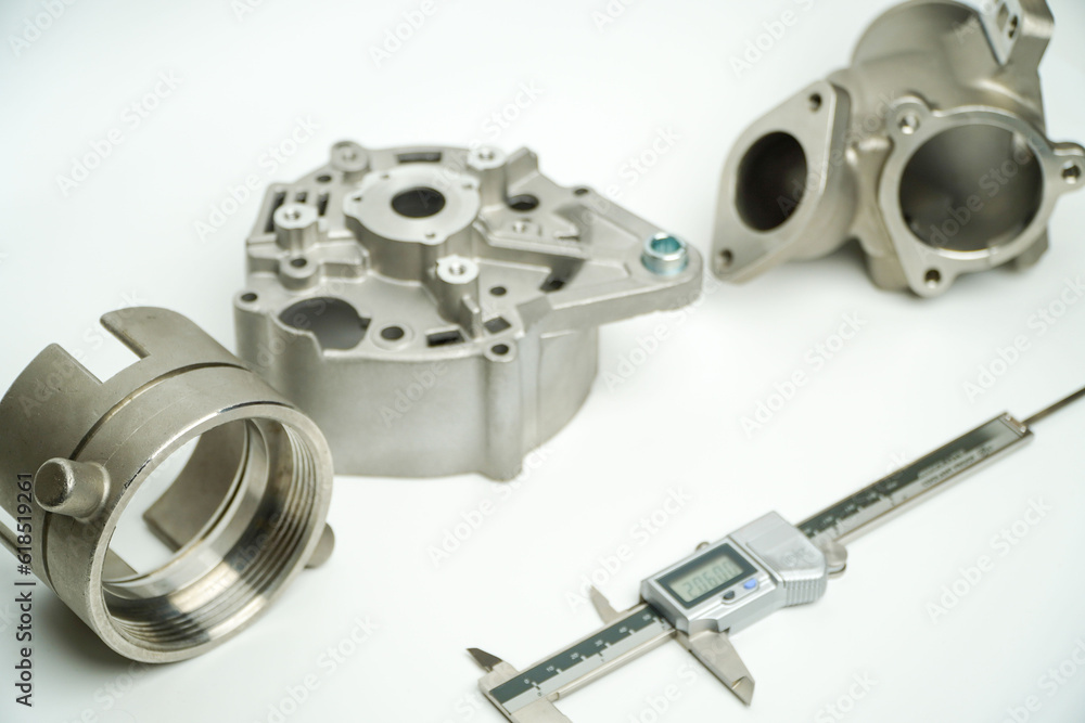 production quality control,Engineers hand measuring metal parts with ...