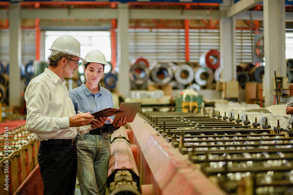 partner woman engineer assistant in helmet inspection check heavy ...