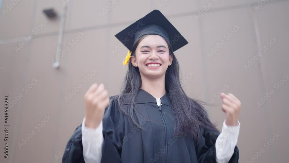 happy graduates celebrate their university graduation. educational ...