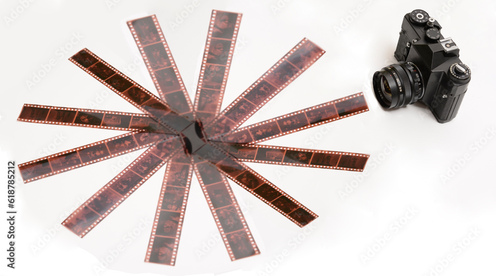 Old photo film roll and retro camera on desk. isolated on white ...