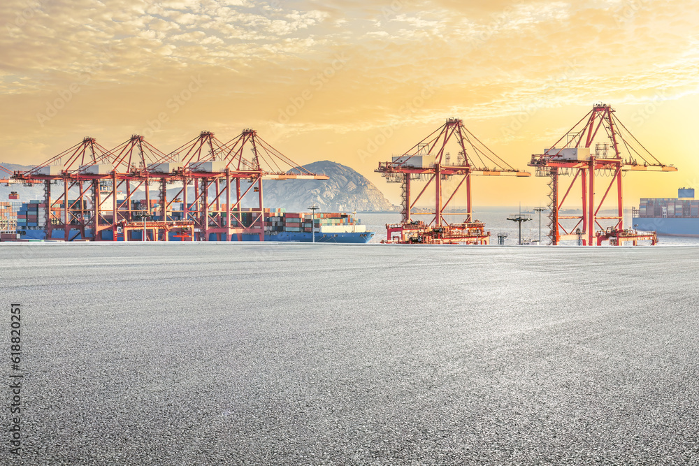 Empty asphalt road and container port background Stock Photo | Adobe Stock