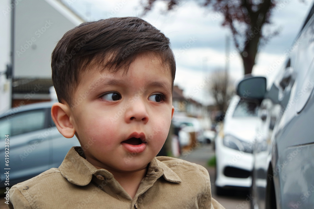 Foto de Cute Asian Pakistani Male Baby Boy is Posing on Local Street of ...