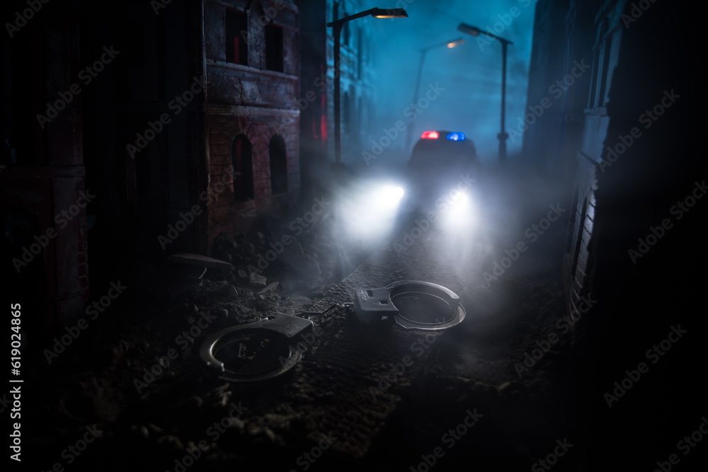 Police raid at night and you are under arrest concept. Silhouette of ...