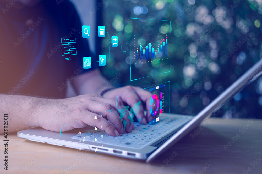 Man uses a computer and dashboard for data business analysis and Data ...