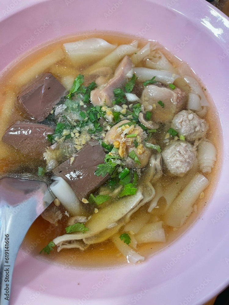 pig blood curd soup with minced pork, pig's organs and ivy gourd leaves ...
