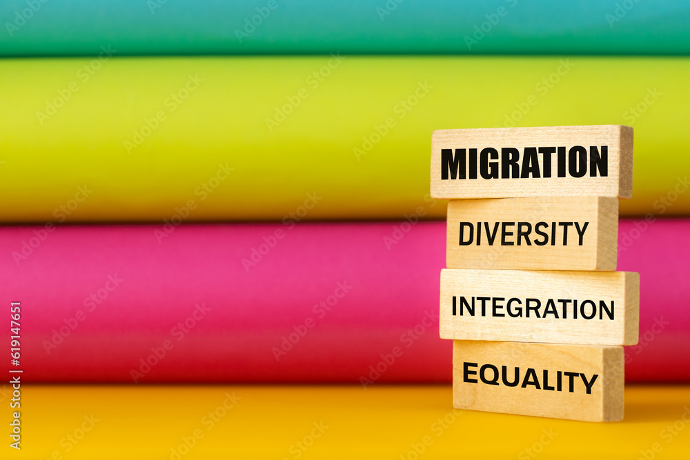 Words migration, diversity, integration and equality on wooden blocks ...