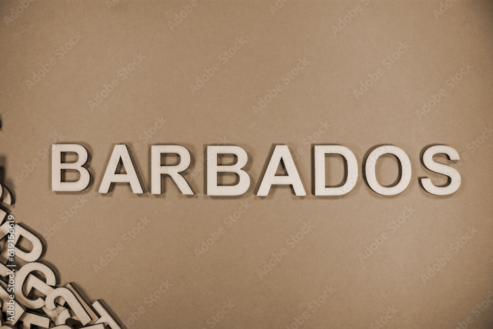 BARBADOS in wooden English language capital letters spilling from a ...