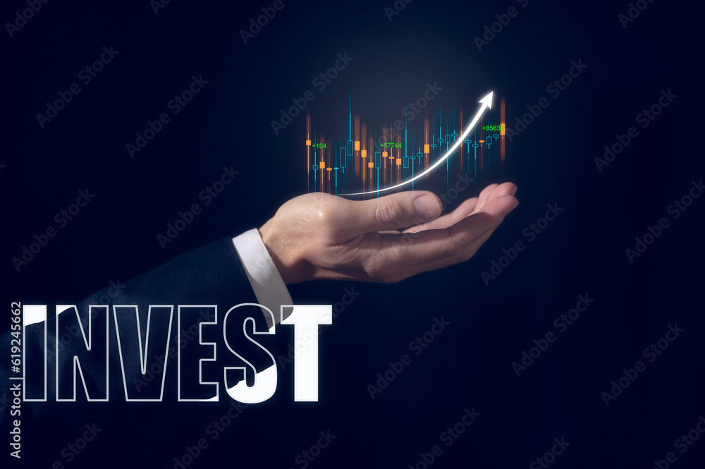 investment and finance concept, businessman holding virtual trading ...