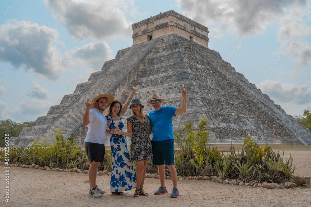 Vacations with friends in the tourist pyramids of Chichen Itza in the Riviera Mayan ...