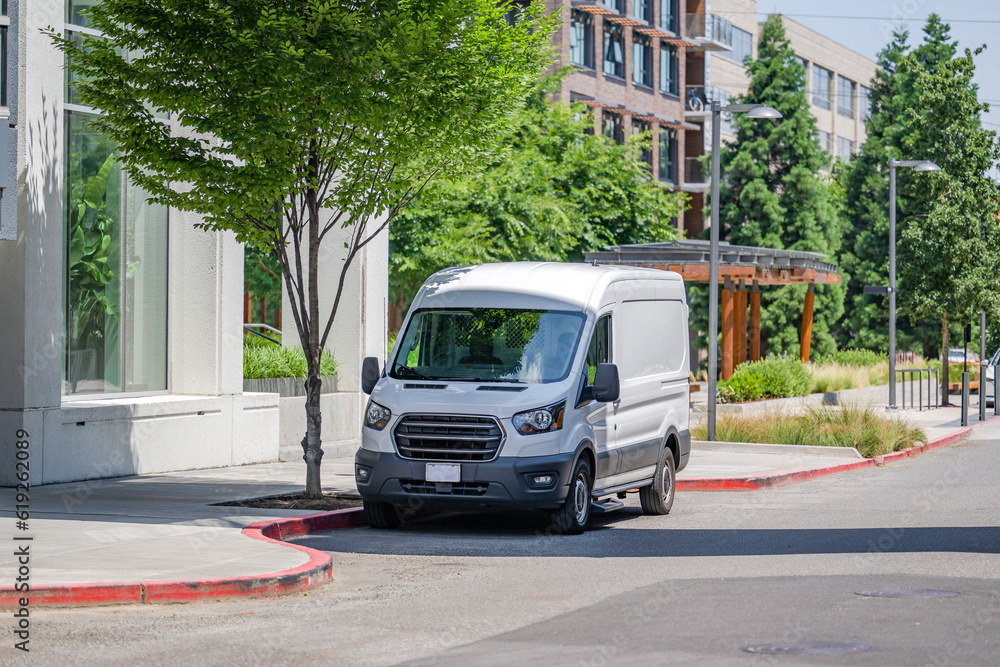 Cargo mini van for delivery and small business use standing on the ...