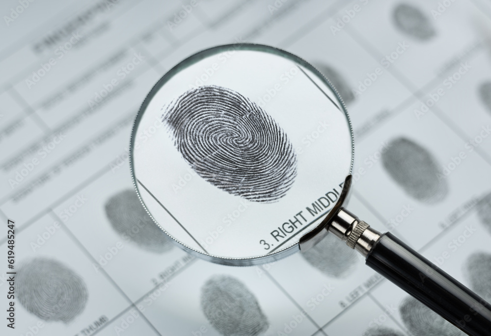 Magnifier and fingerprint police form. Background on the theme crime ...