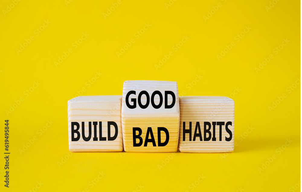Build Good or Bad Habits symbol. Wooden cubes with words Build Bad ...