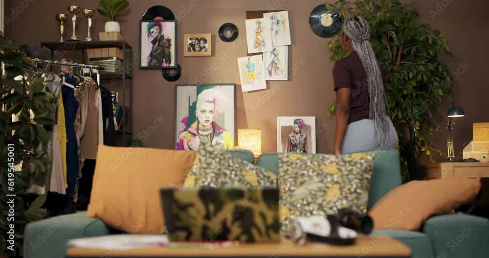 Talented African artist, effortlessly glides across the room. With ...