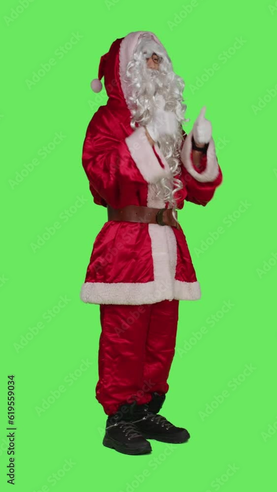 Saint nick in costume does thumbs up standing over full body ...
