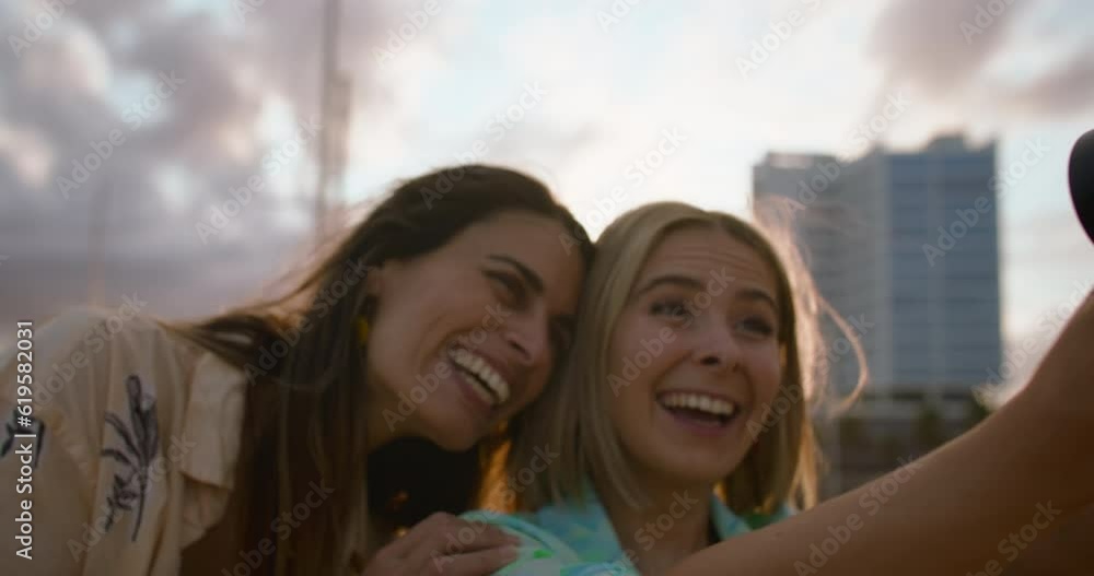Two best friends make selfie photo on instant vintage camera, excited ...