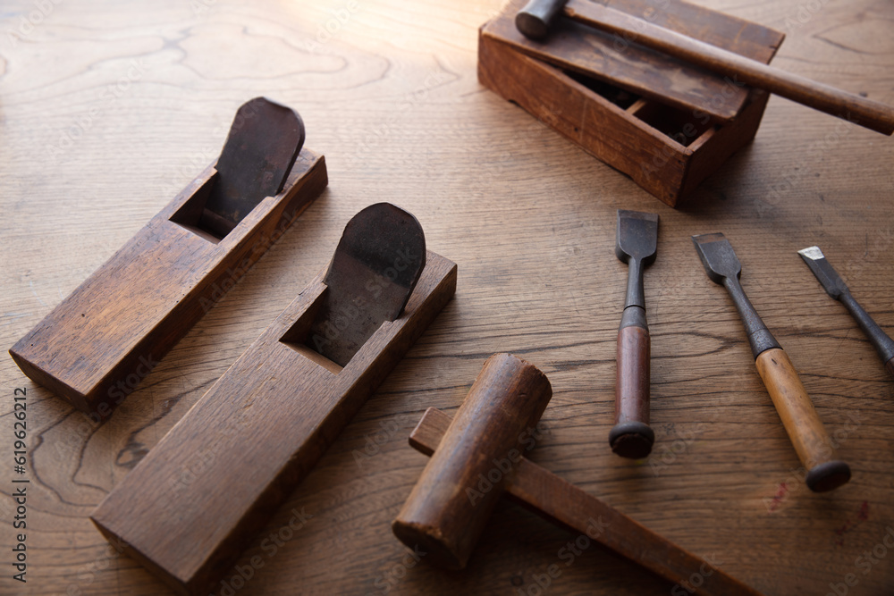 Japanese wood working tools on an old rustic work table. Vintage ...