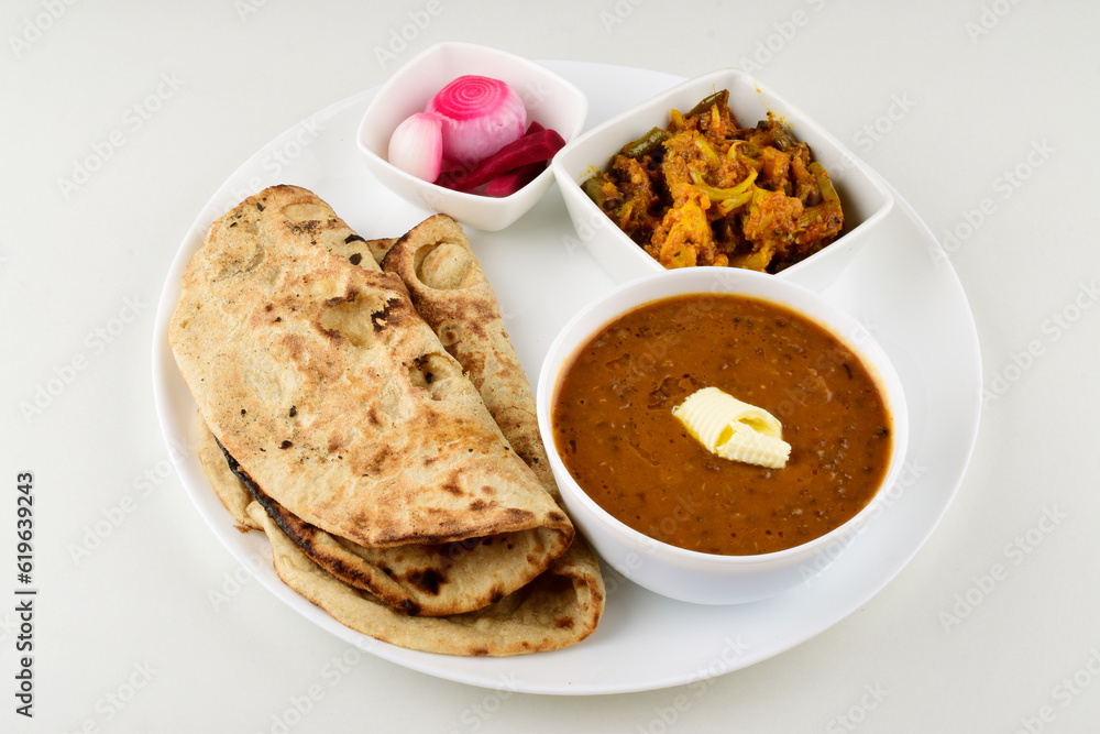 Indian food in plate isolated on white background, dal roti sabji Stock ...