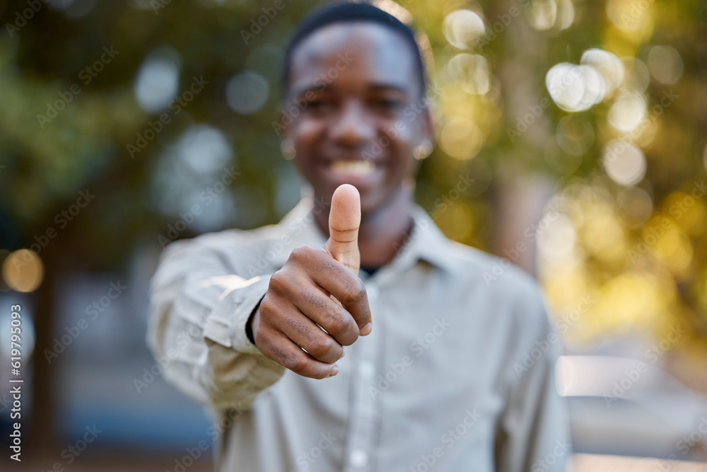 Black man, hands and thumbs up in park for good job, approval or ...