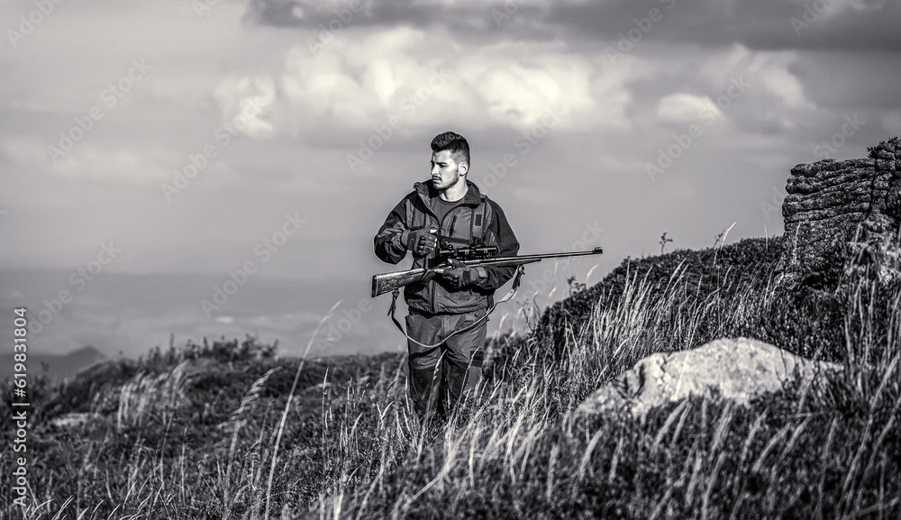 Hunter man. Male with a gun. Hunter with hunting gun and hunting form ...
