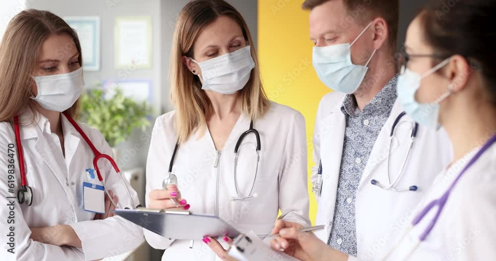 Doctors discussing deadly dangerous disease of patient in clinic 4k ...