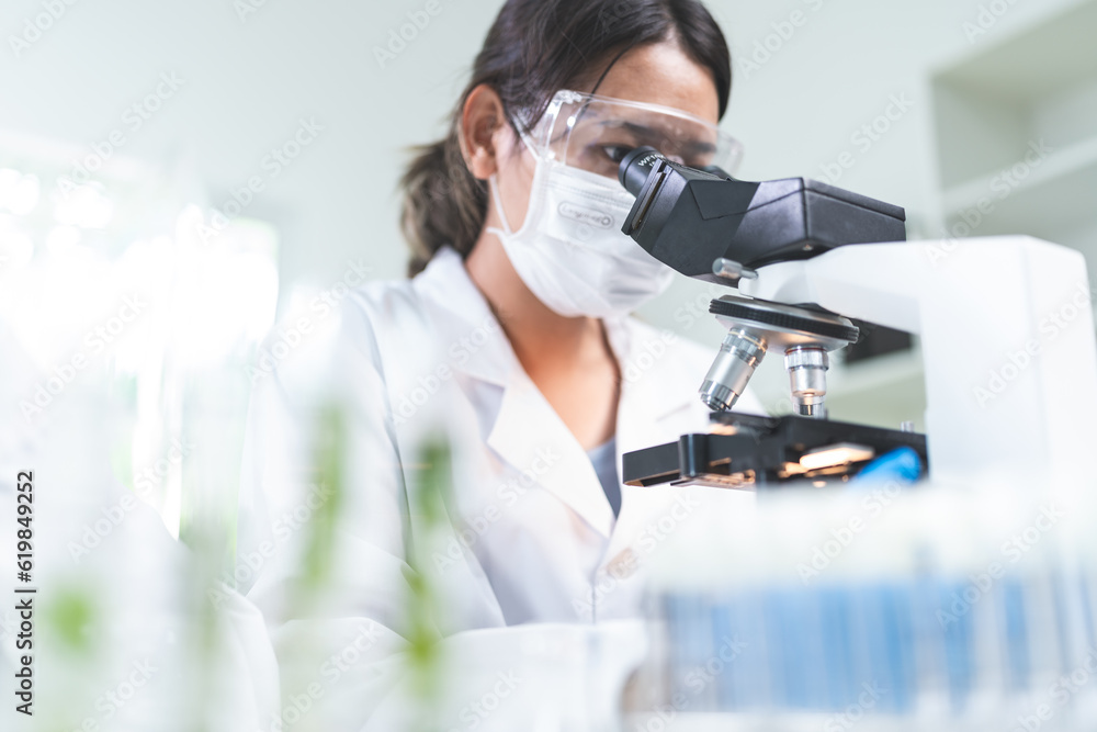 Health care researchers working in life science laboratory, medical ...
