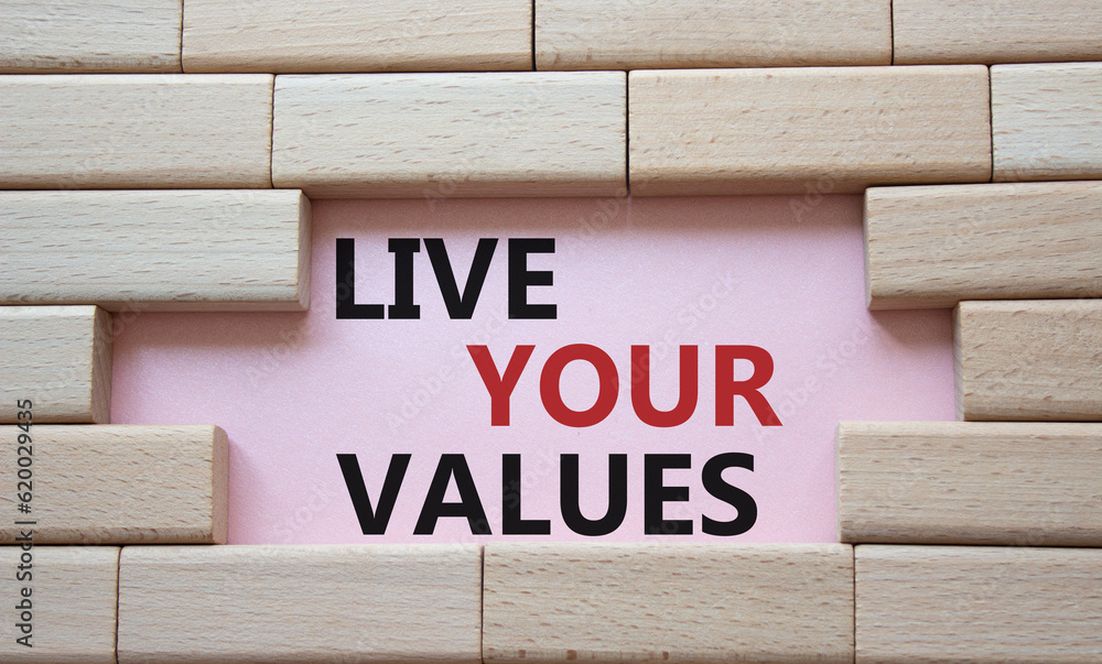 Live your values symbol. Concept words Live your values on wooden ...