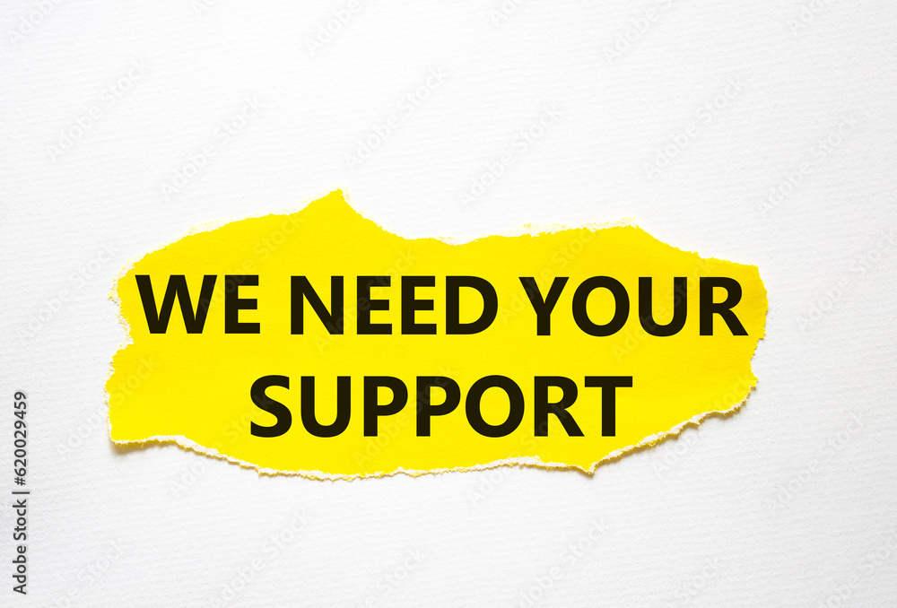 We need your support symbol. Torn yellow paper with words We need your ...