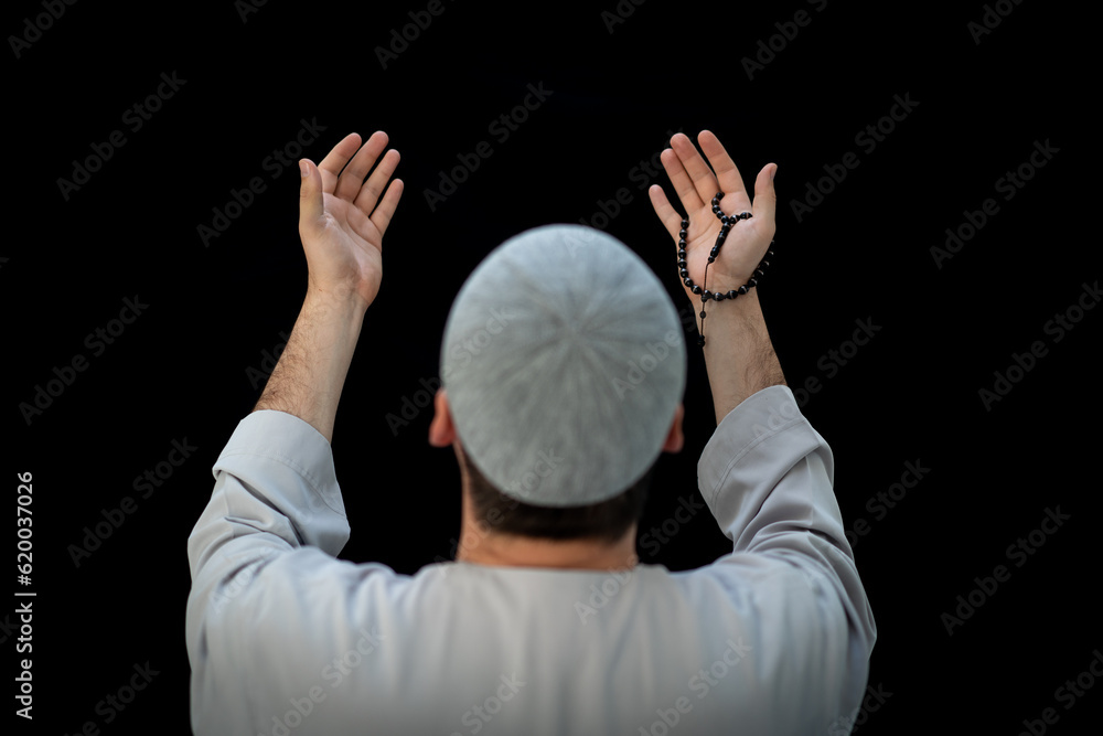 Muslim man standing and praying in the front of Kaaba in Mecca, KSA ...