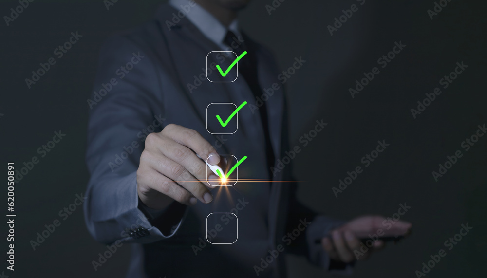 businessman check mark in checklist with check mark, online checklist ...