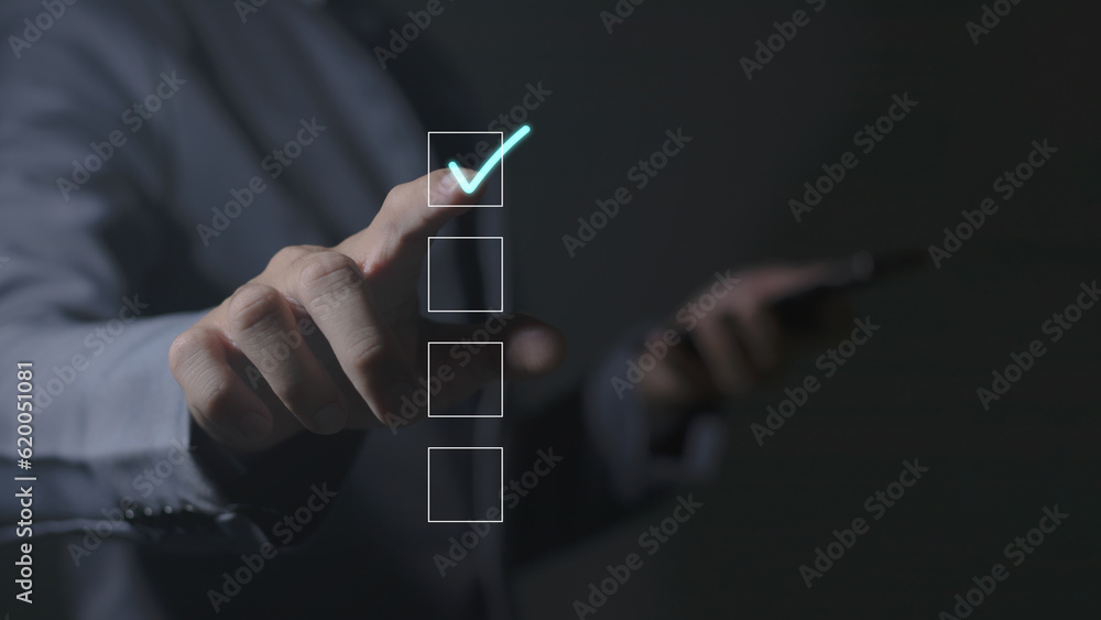 businessman check mark in checklist with check mark, online checklist ...