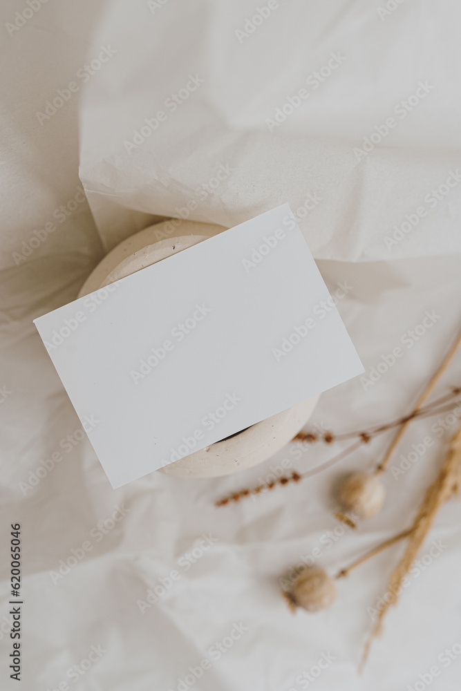 Card sheet with blank empty free copy space for mock up, dried grass ...