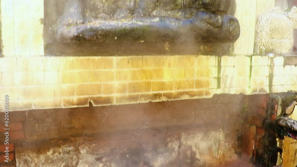 ancient shiva statue with natural holy hot spring water at day from ...