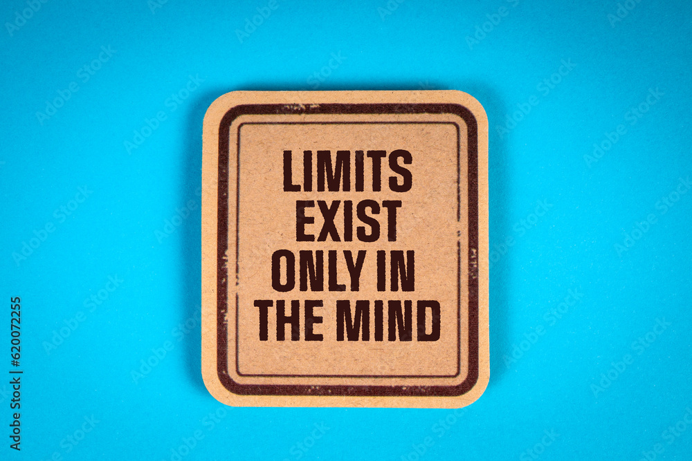 LIMITS EXIST ONLY IN THE MIND. Cardboard sticker with text on a blue ...