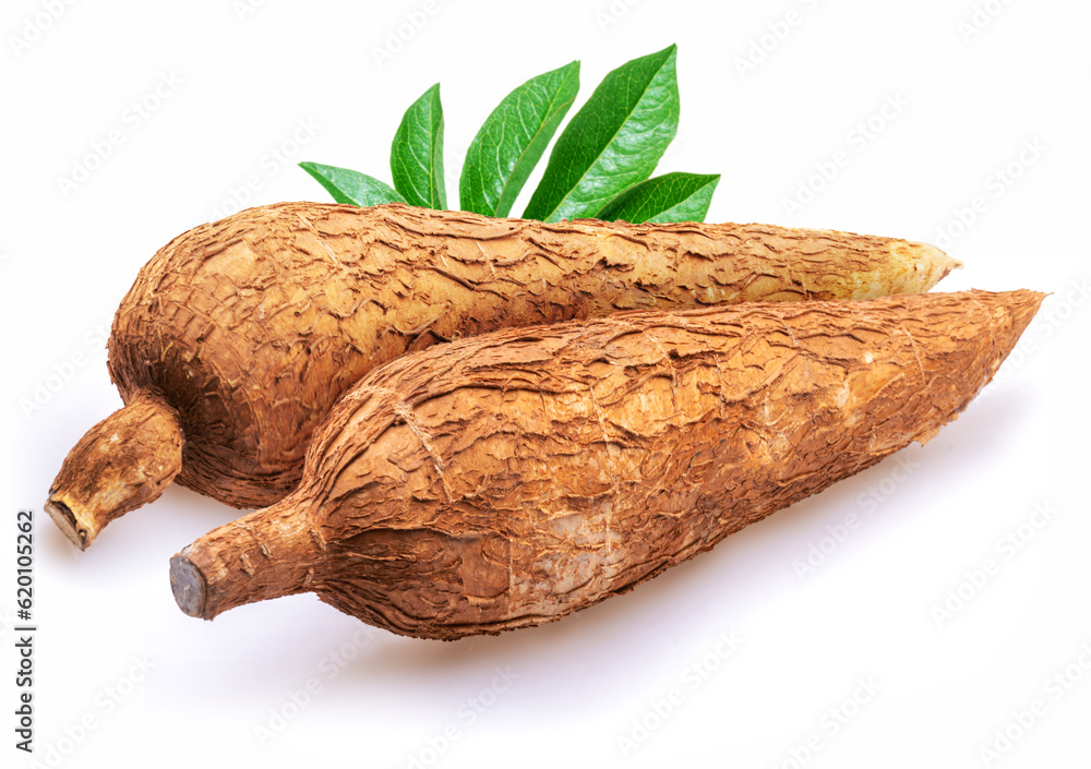 Poster Cassava tubers with leaves isolated on white background ...