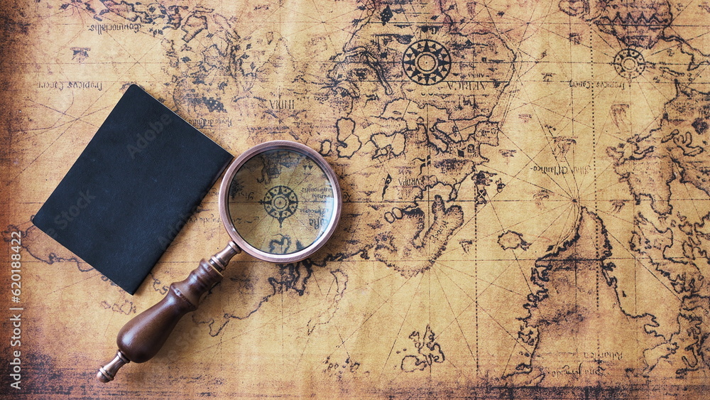 Magnifying glass and an ancient old map,Old map with an magnifying ...