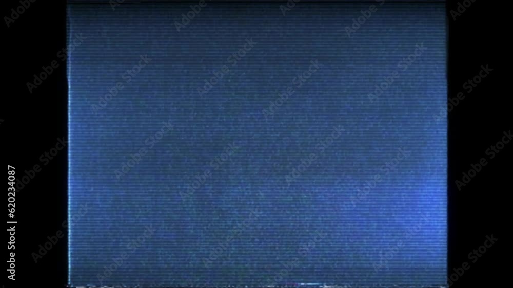 A television screen with VHS effect of digital pixelated noise ...