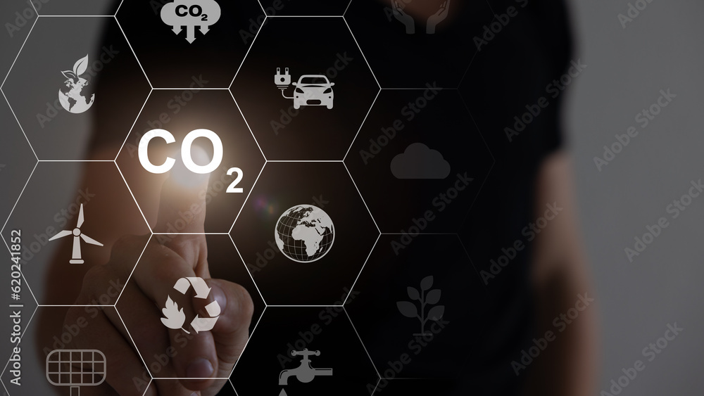 Businessman wit team working virtual modern smart phone to reduce CO2 ...