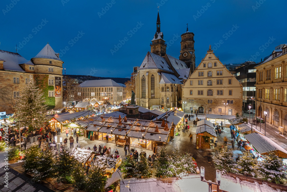 Christmas market on Schillerplatz square in front of Stiftskirche ...