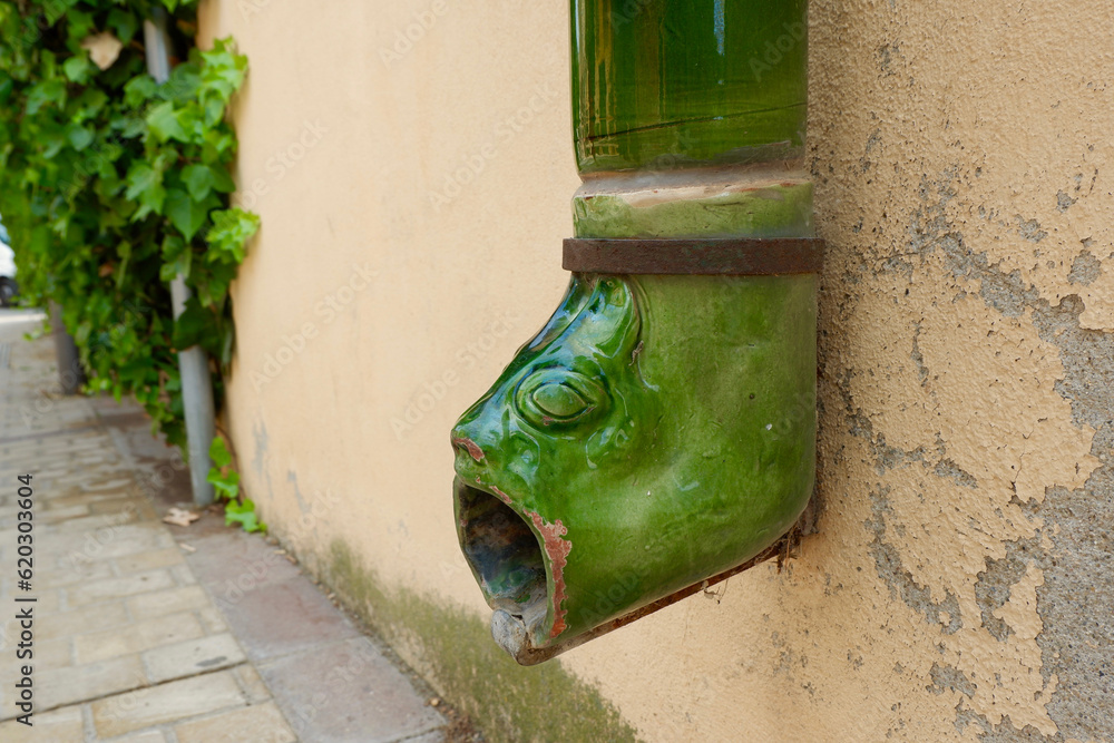 Vintage ceramic pipe of the rain sewerage system made to drainage water ...